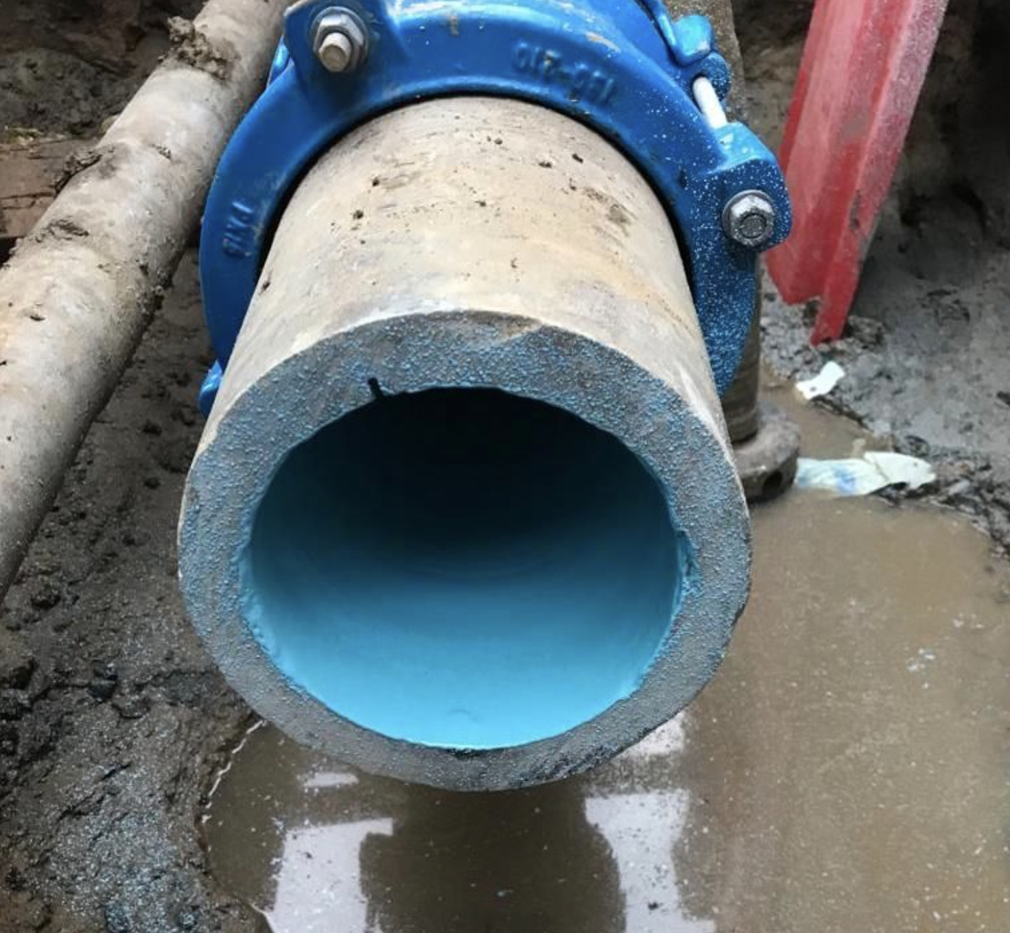 Renforcement et isolation des conduites en amiante-ciment pour la ...